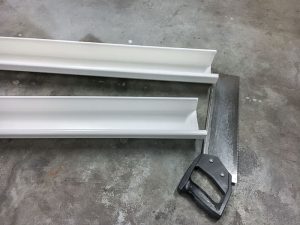 Easy DIY Rain Gutter Bookshelves - How To Install - Anika's DIY Life