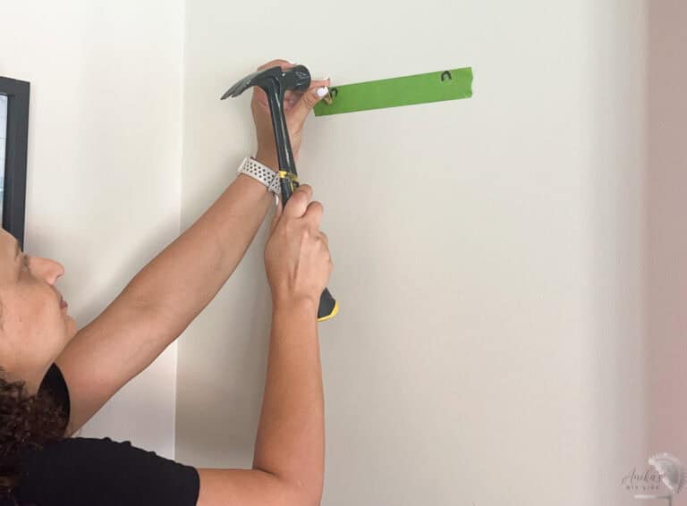 How To Hang A Picture On A Wall - Anika's DIY Life